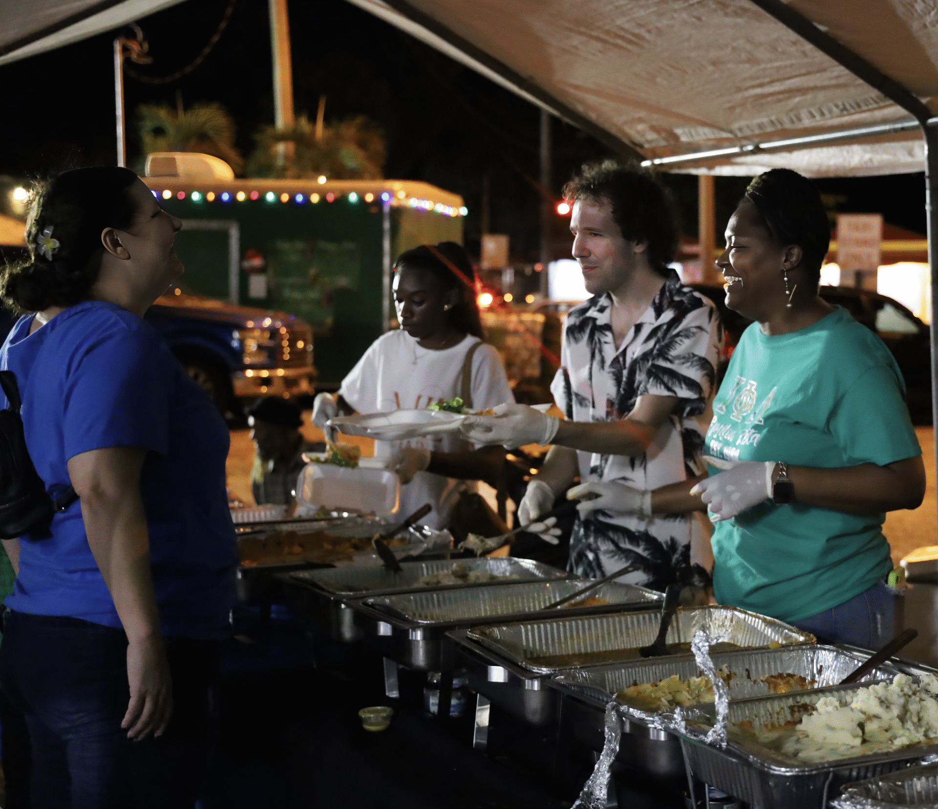 Community Dinner Turns Emancipation Garden Into a Table for 200 | St ...